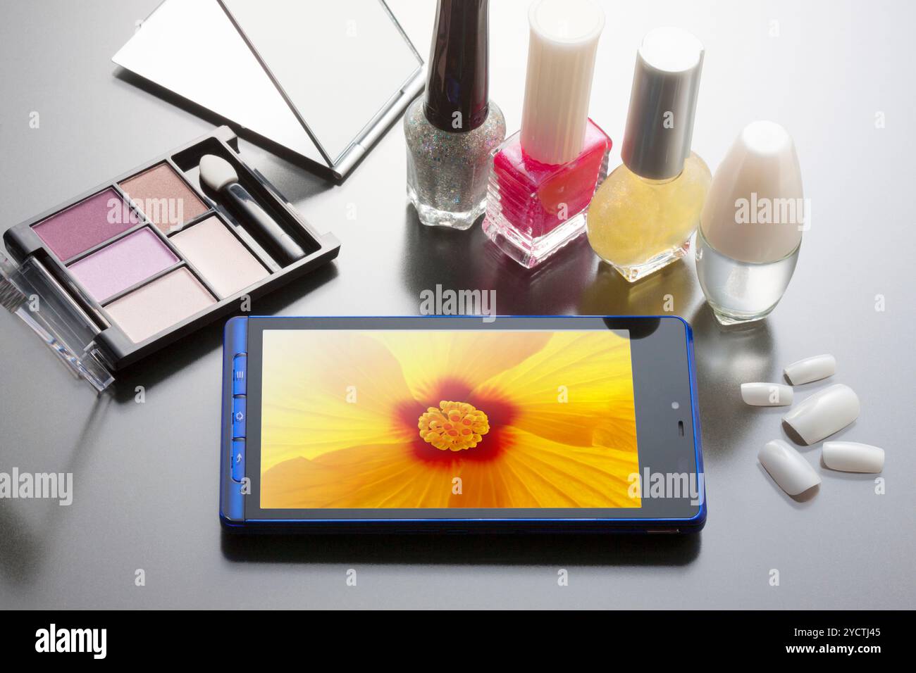 Smartphone and cosmetics Stock Photo - Alamy