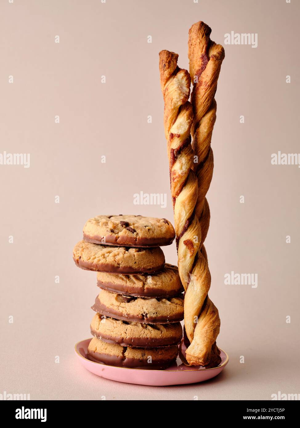 Chocolate biscuits and puff pastry sticks Stock Photo - Alamy