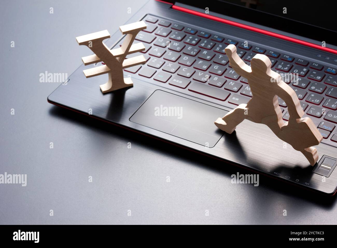 Wooden carved circular symbol and running businessman Stock Photo - Alamy