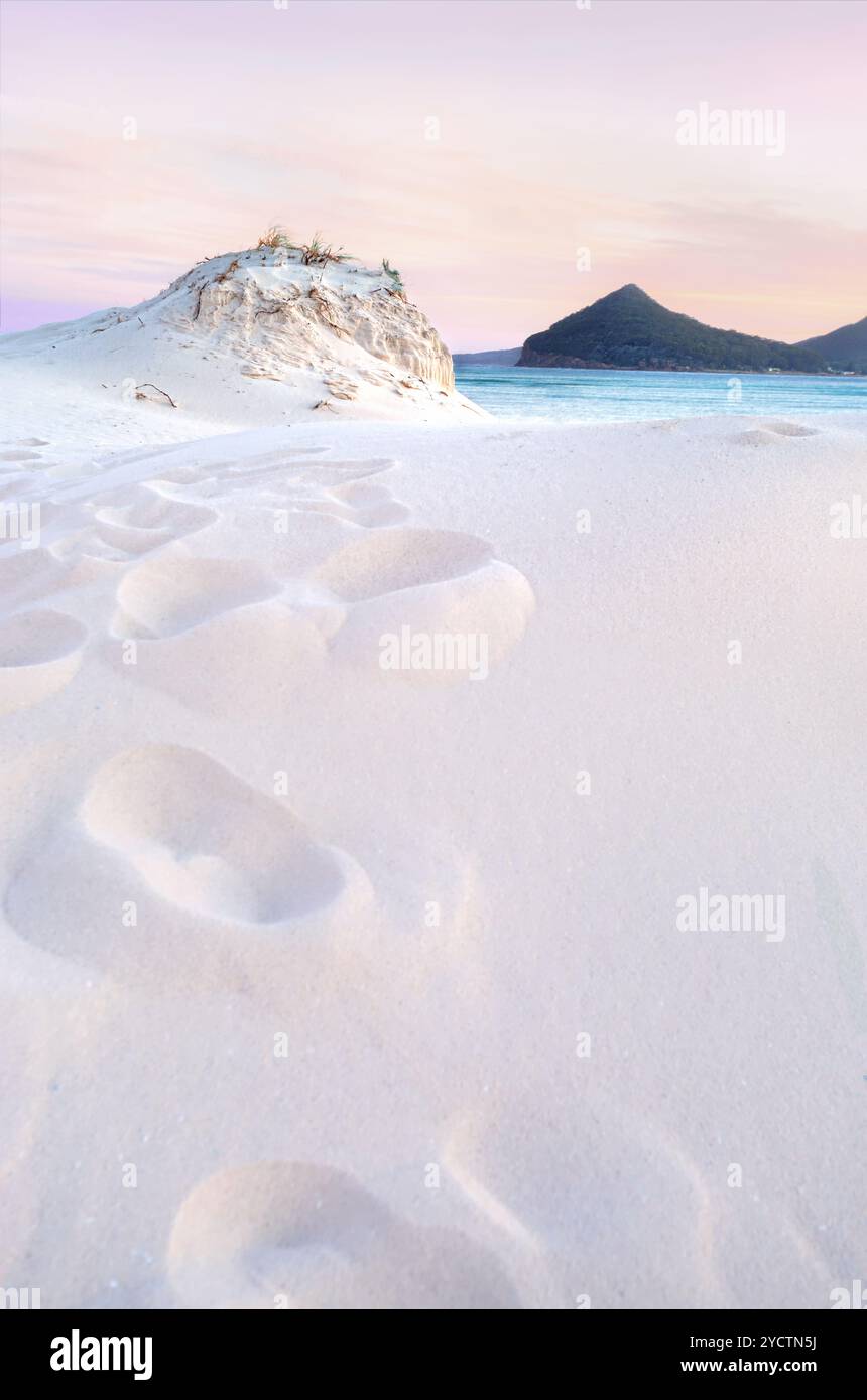 Sunset across the sand dunes Stock Photo - Alamy