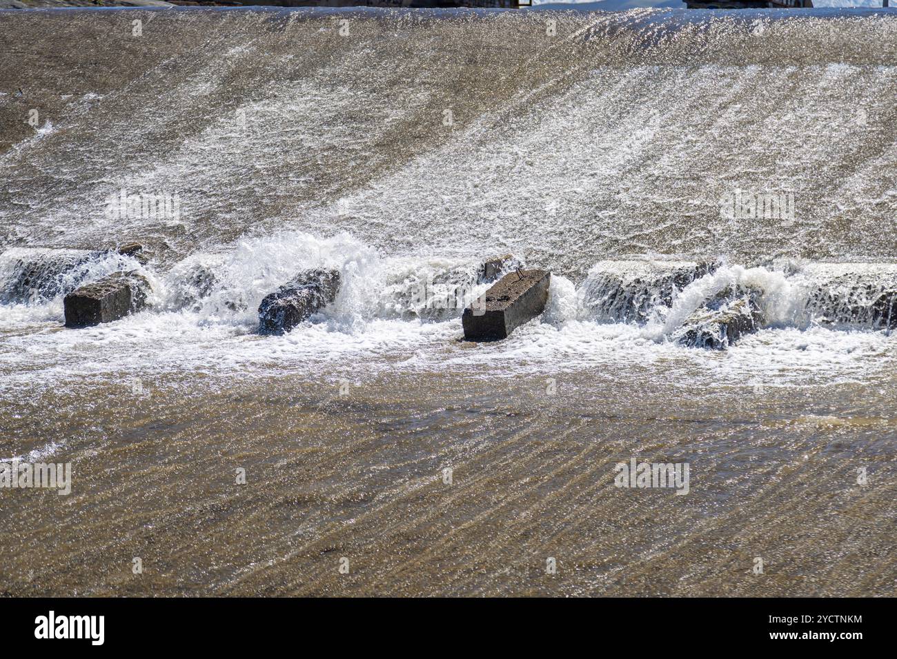 chute dentate blocks in concrete water spillway channel Stock Photo - Alamy