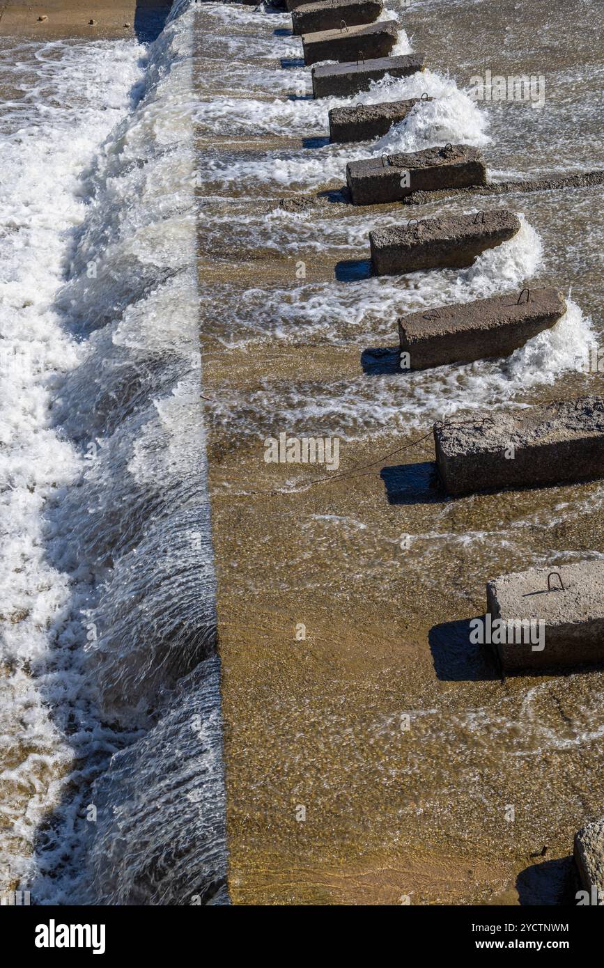 chute dentate blocks in concrete water spillway channel Stock Photo - Alamy