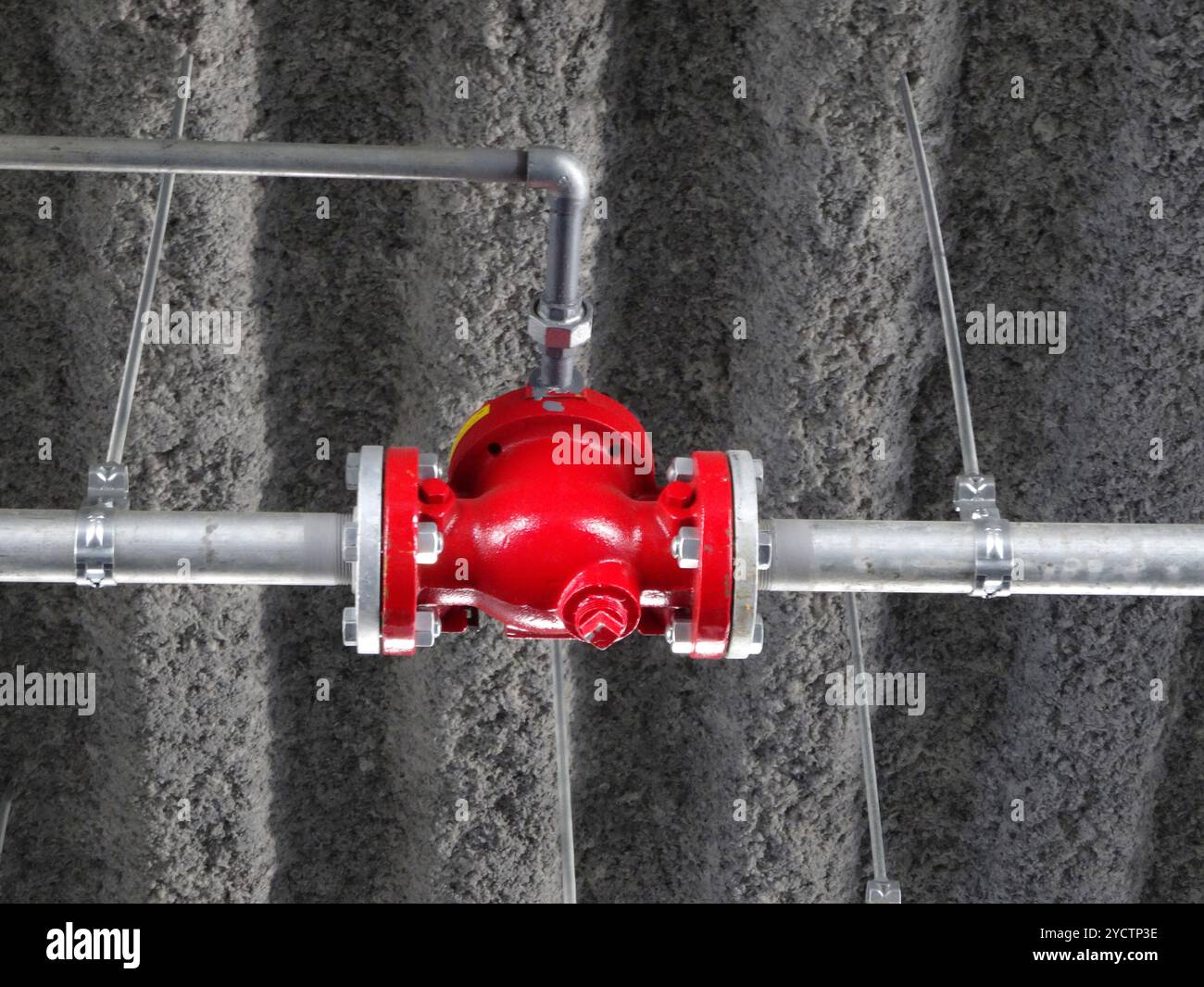 Sprinkler distribution pipes in parking lots Stock Photo - Alamy