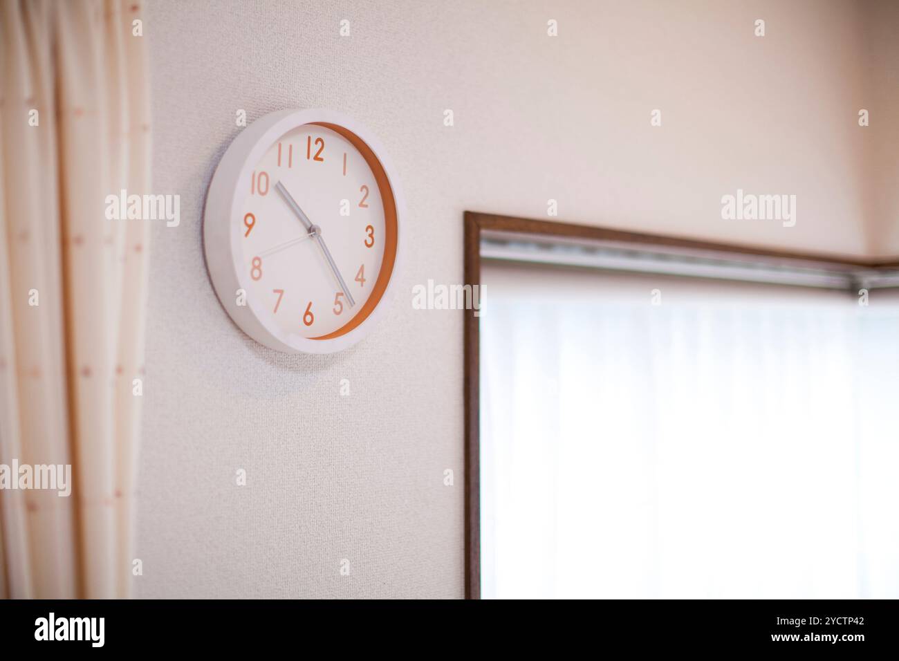 Wall clock in children's room Stock Photo - Alamy
