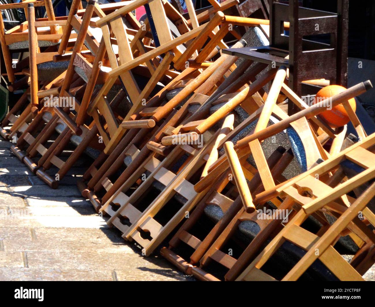 Dining room chairs covered in mud from flooding on the Kyoto Ranzan ...