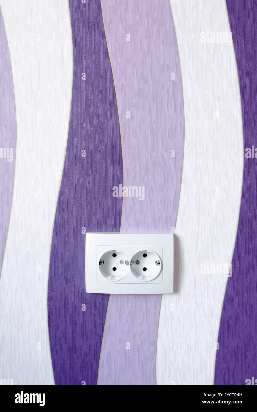 double electrical socket on the striped wall Stock Photo - Alamy