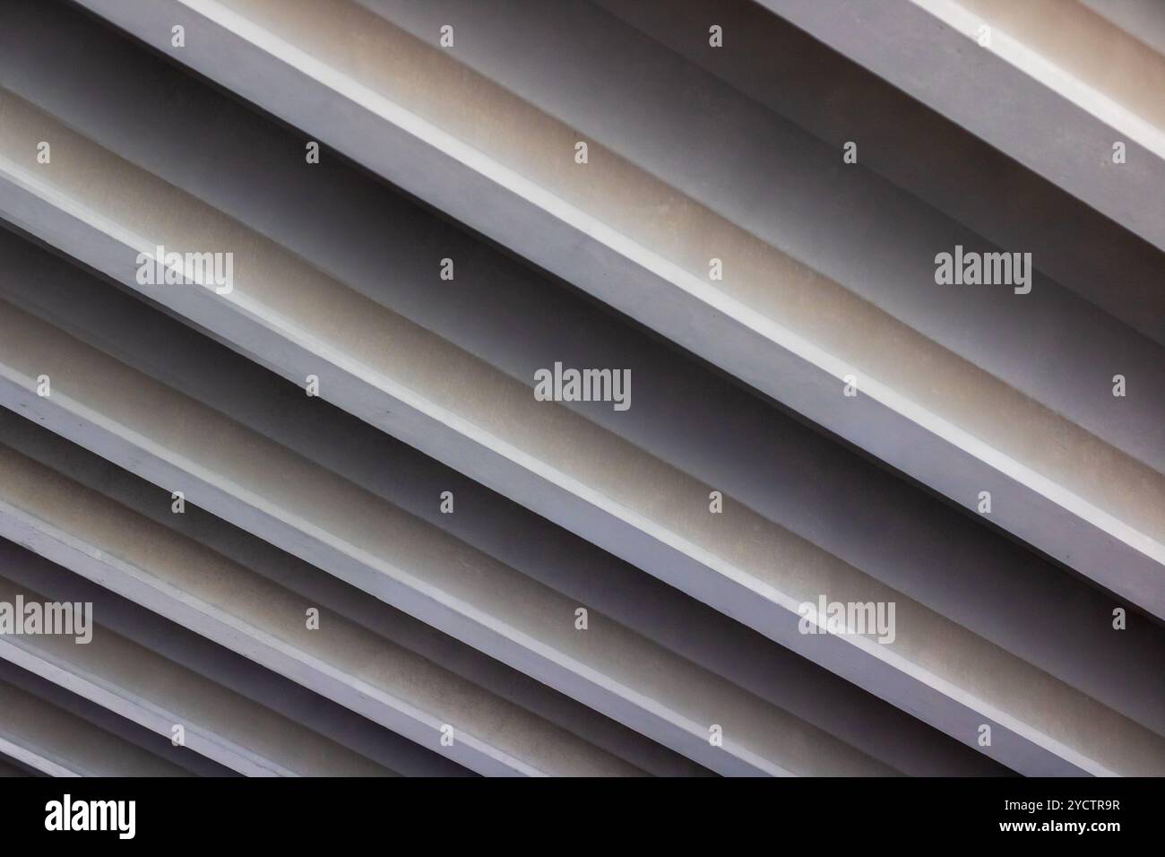 The image displays a detailed closeup view of a straight row of gray ...