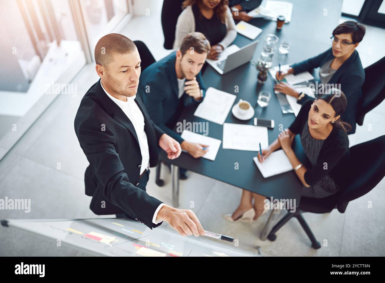 Business people, whiteboard and sticky notes for plan in office ...