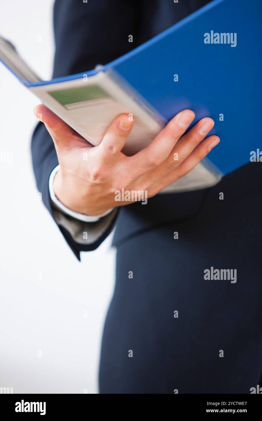 Young businessman folder hi-res stock photography and images - Alamy