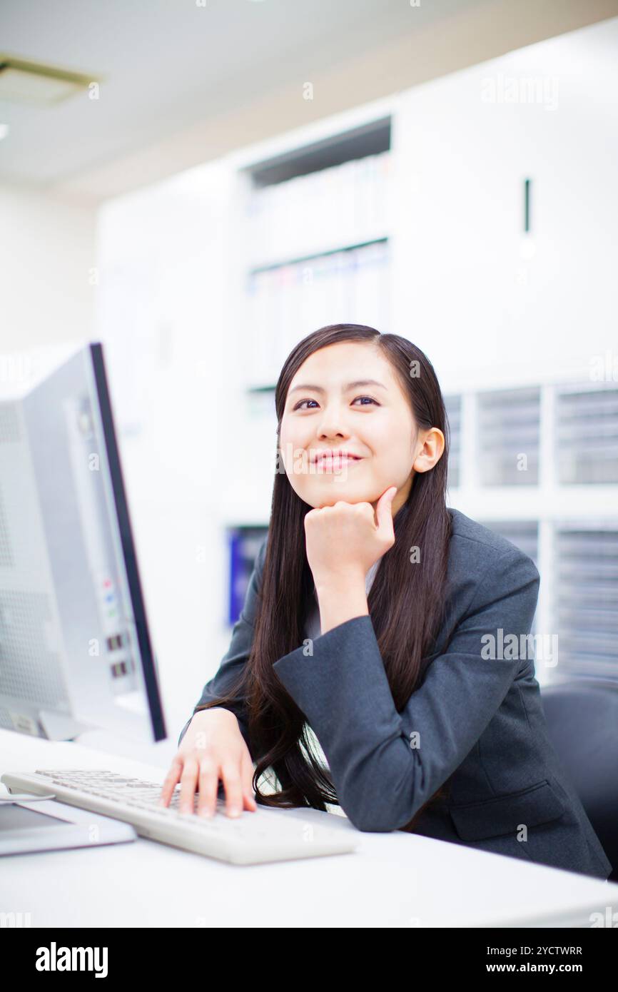 Office worker with desk job Stock Photo - Alamy