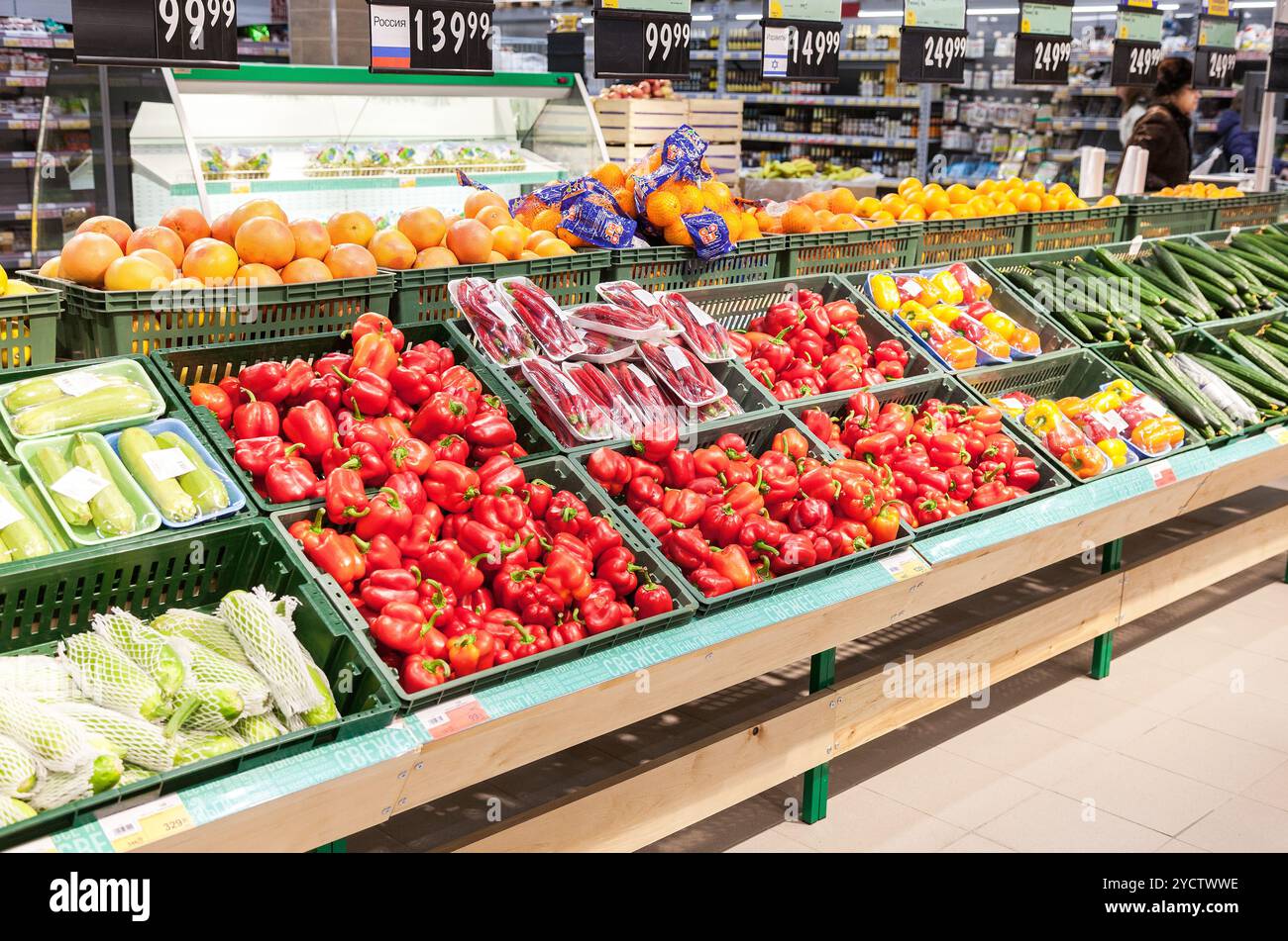 Fresh vegetables and fruits ready for sale in supermarket Lenta. One of ...
