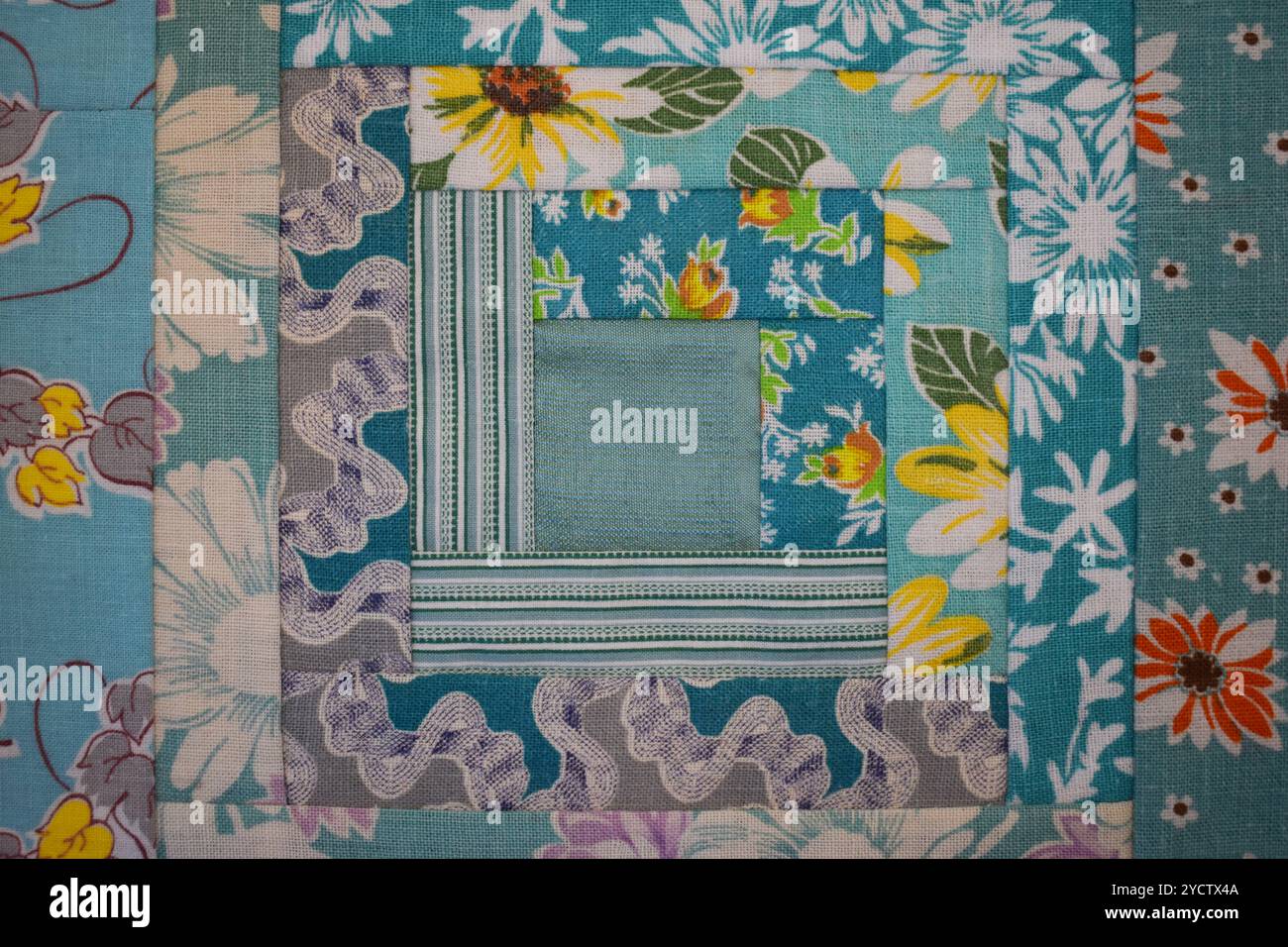 Log cabin quilt square made from vintage feedsack fabric Stock Photo ...