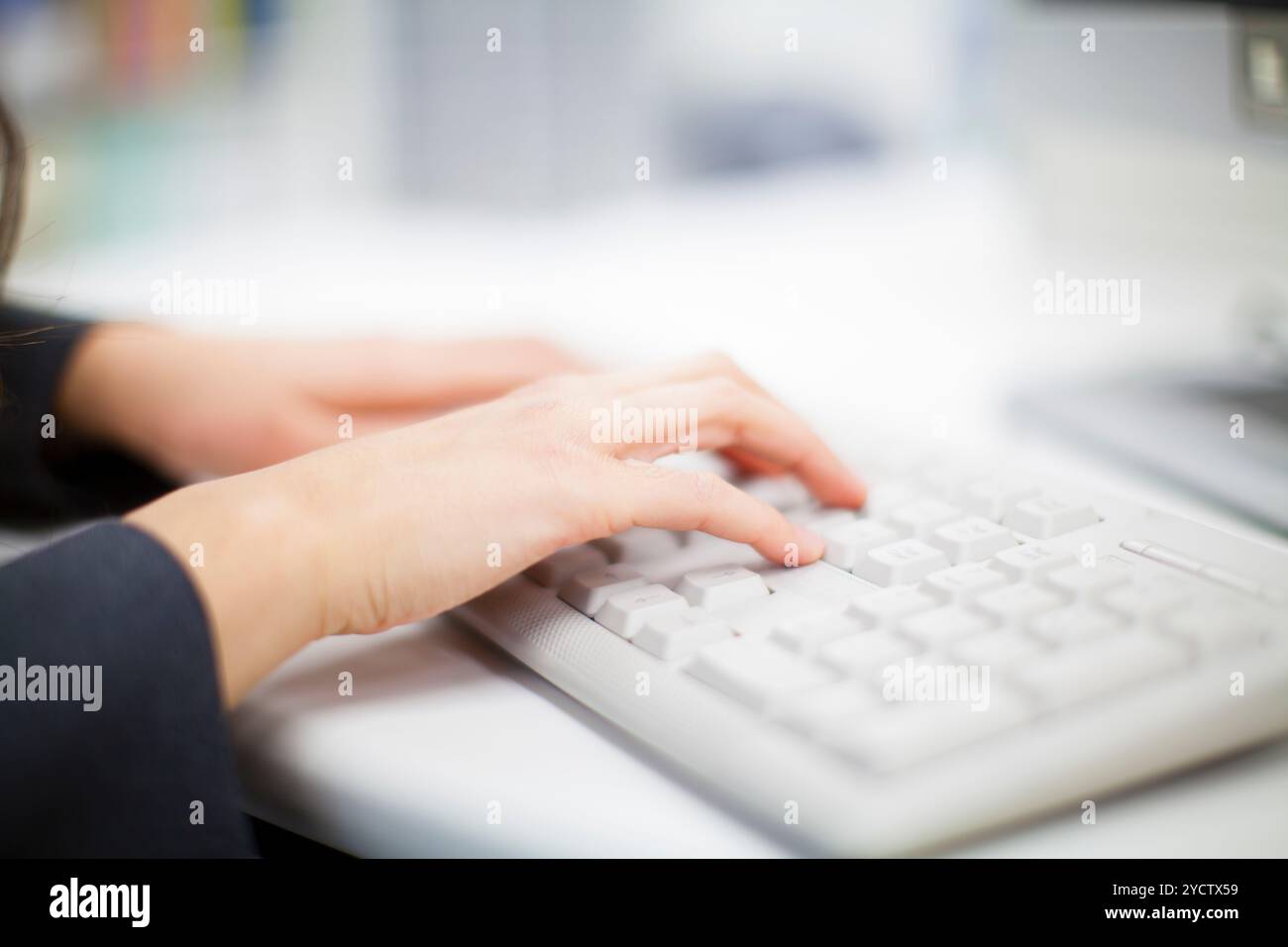 Office worker's hand on keyboard Stock Photo - Alamy