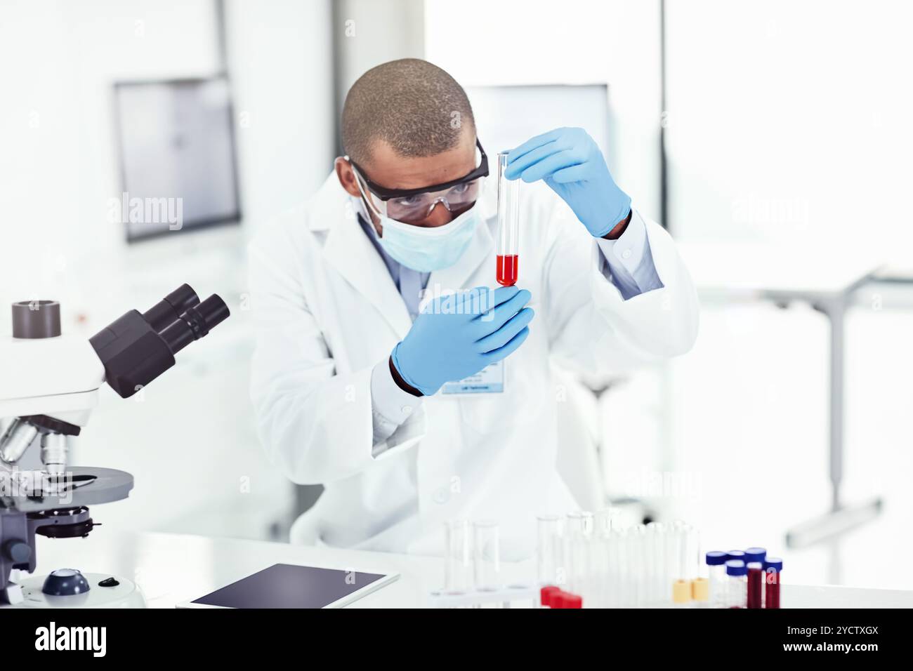 Man, scientist and blood in test tube at laboratory with thinking ...