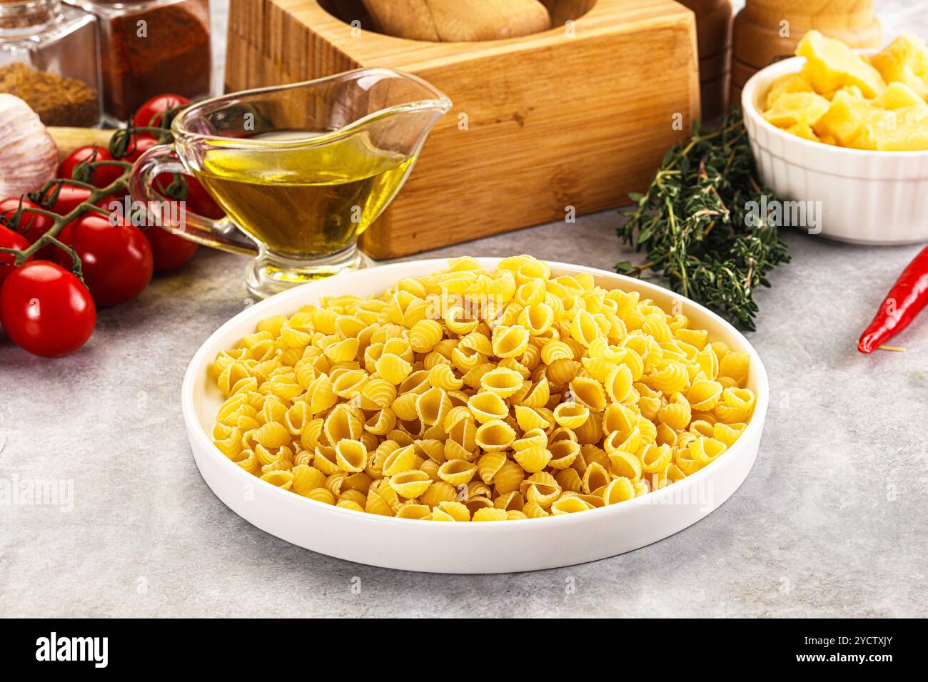 Italian cuisine - dry conchiglie shell pasta Stock Photo - Alamy