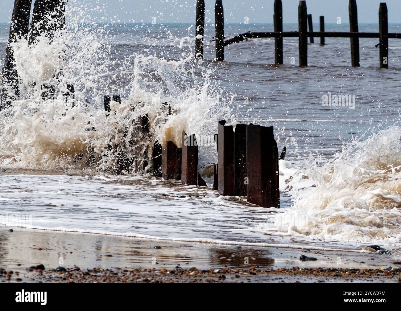 Waves crashing on the destroyed and abandoned sea defences at Haisbro ...