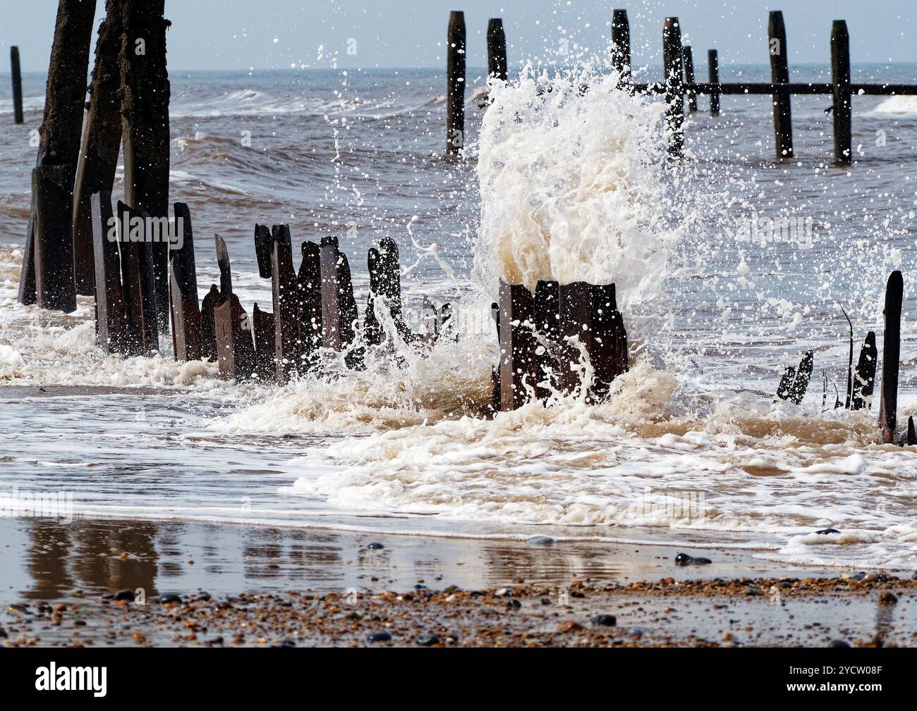 Waves crashing on the destroyed and abandoned sea defences at Haisbro ...