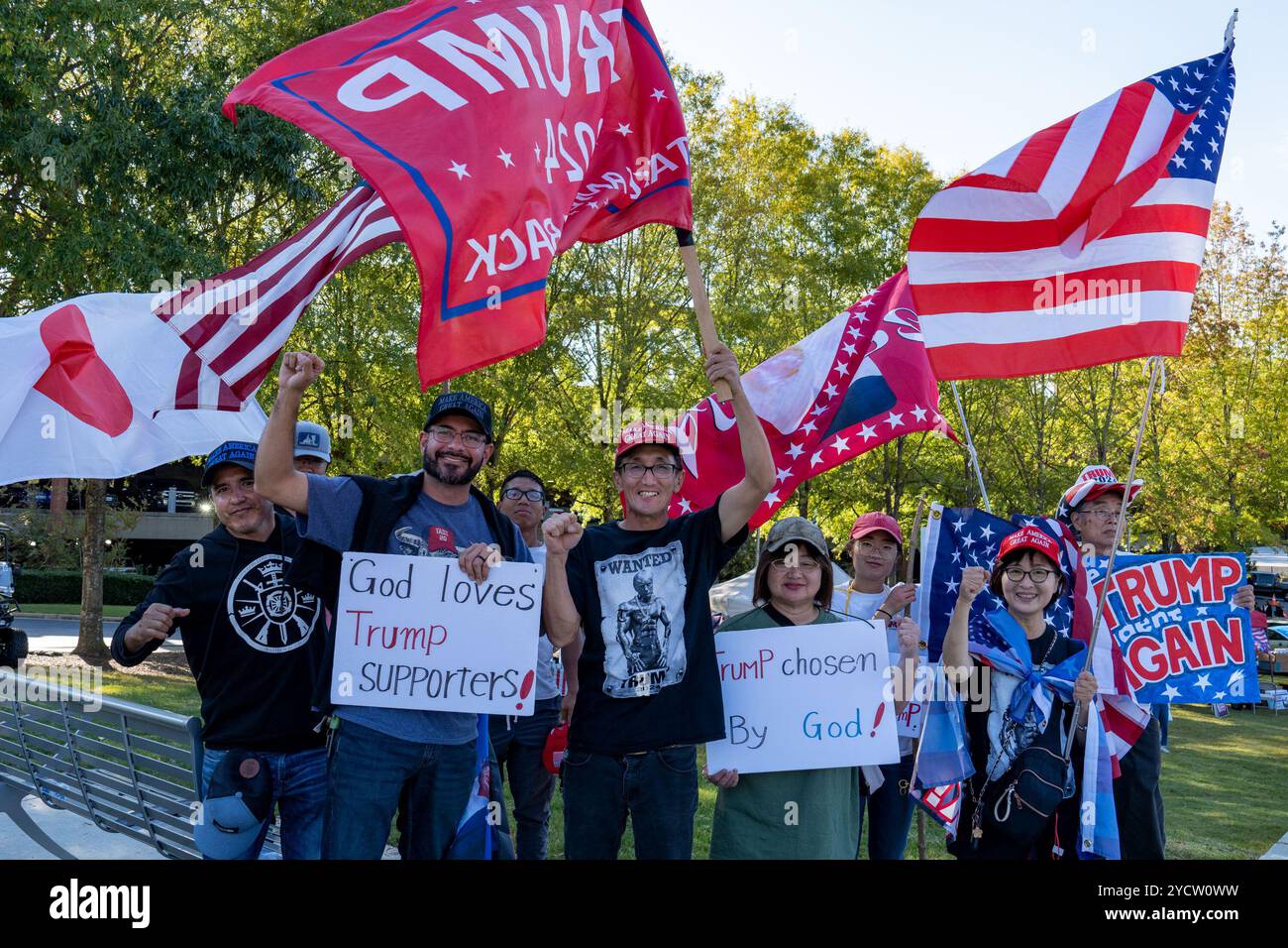 Donald Trump’ supporters at an election rally at the Gas South Arena in ...