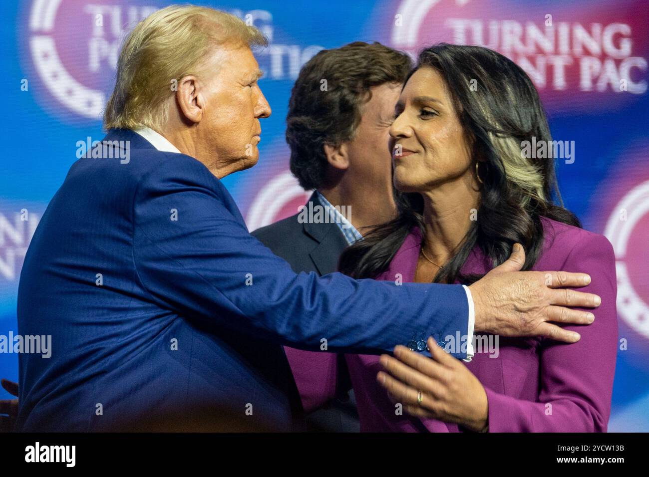 Donald Trump and Tulsi Gabbard at an election rally at the Gas South ...