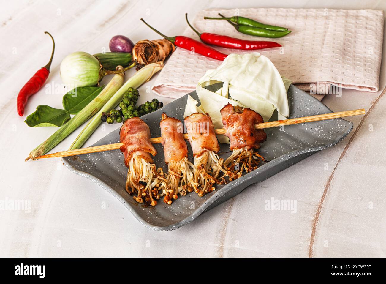 Thai Street foof satay with bacon and mushroom enoki skewer Stock Photo ...