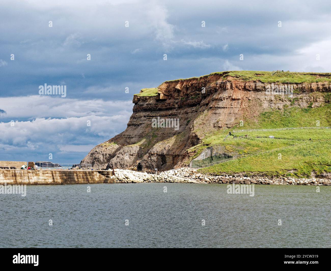 Spectacular cliffs on the east side of Whitby harbour formed of ...