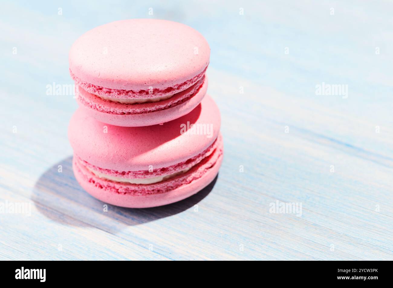Two pink macarons Stock Photo - Alamy