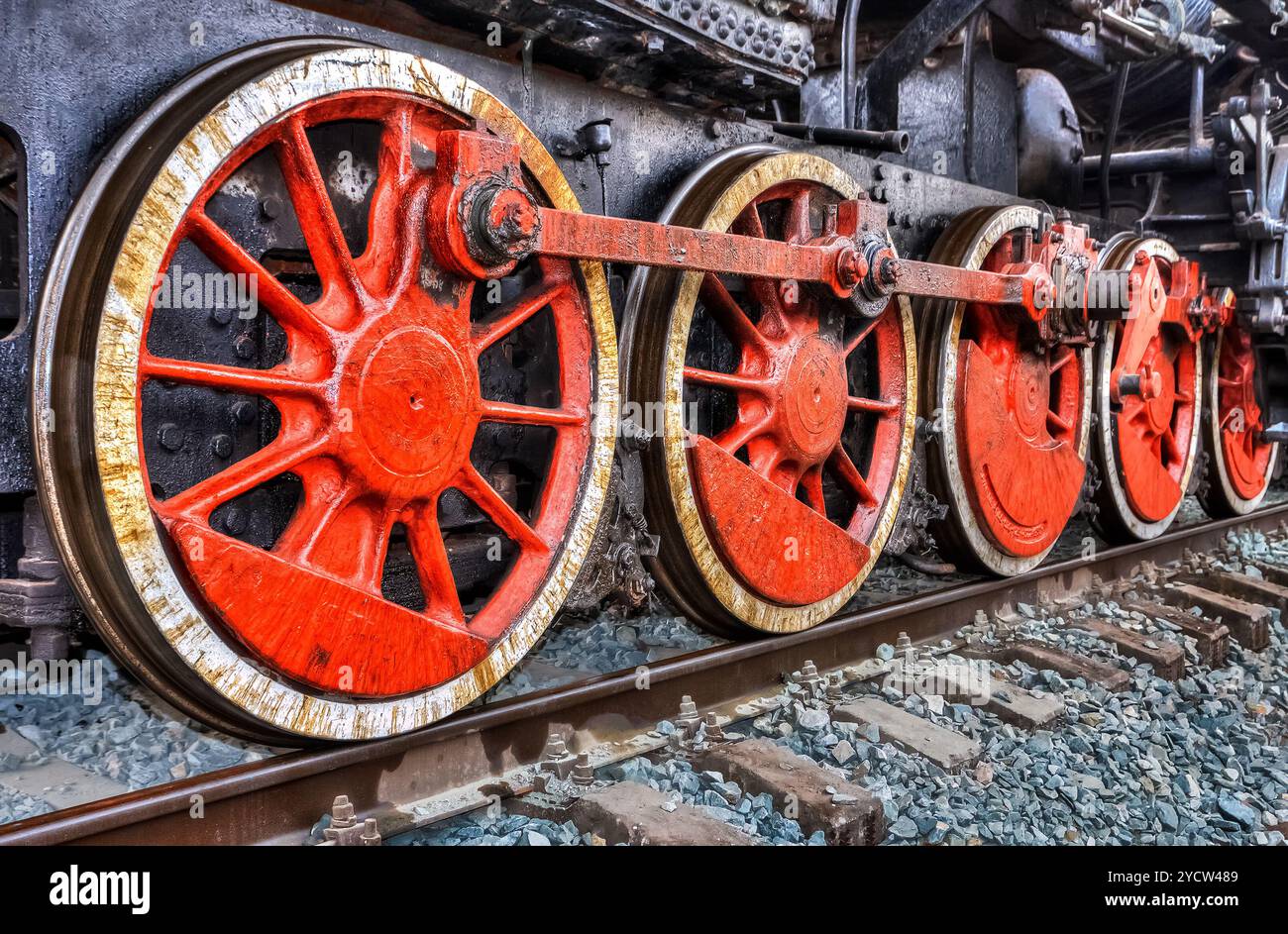 Old steam locomotive engine wheel and rods details Stock Photo - Alamy