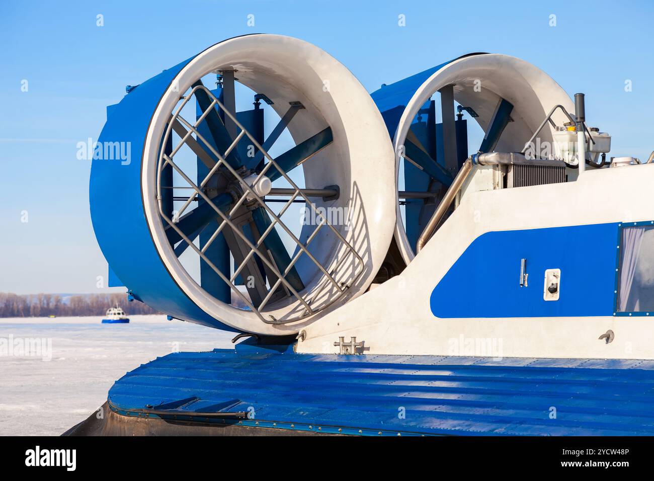 Turbo-prop engine of a naval hovercraft on the ice of the frozen river ...