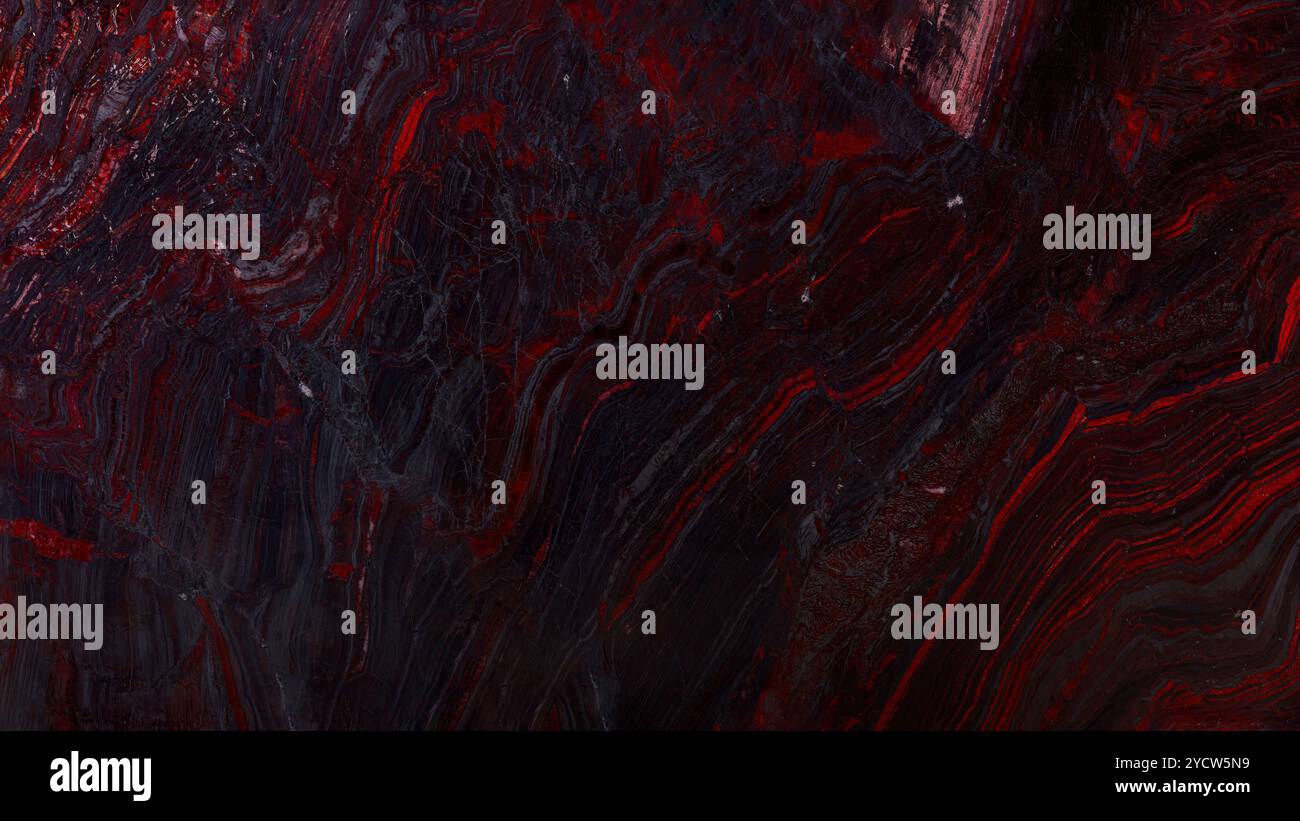 Natural granite slab with striking red and dark streaks, showcasing a ...