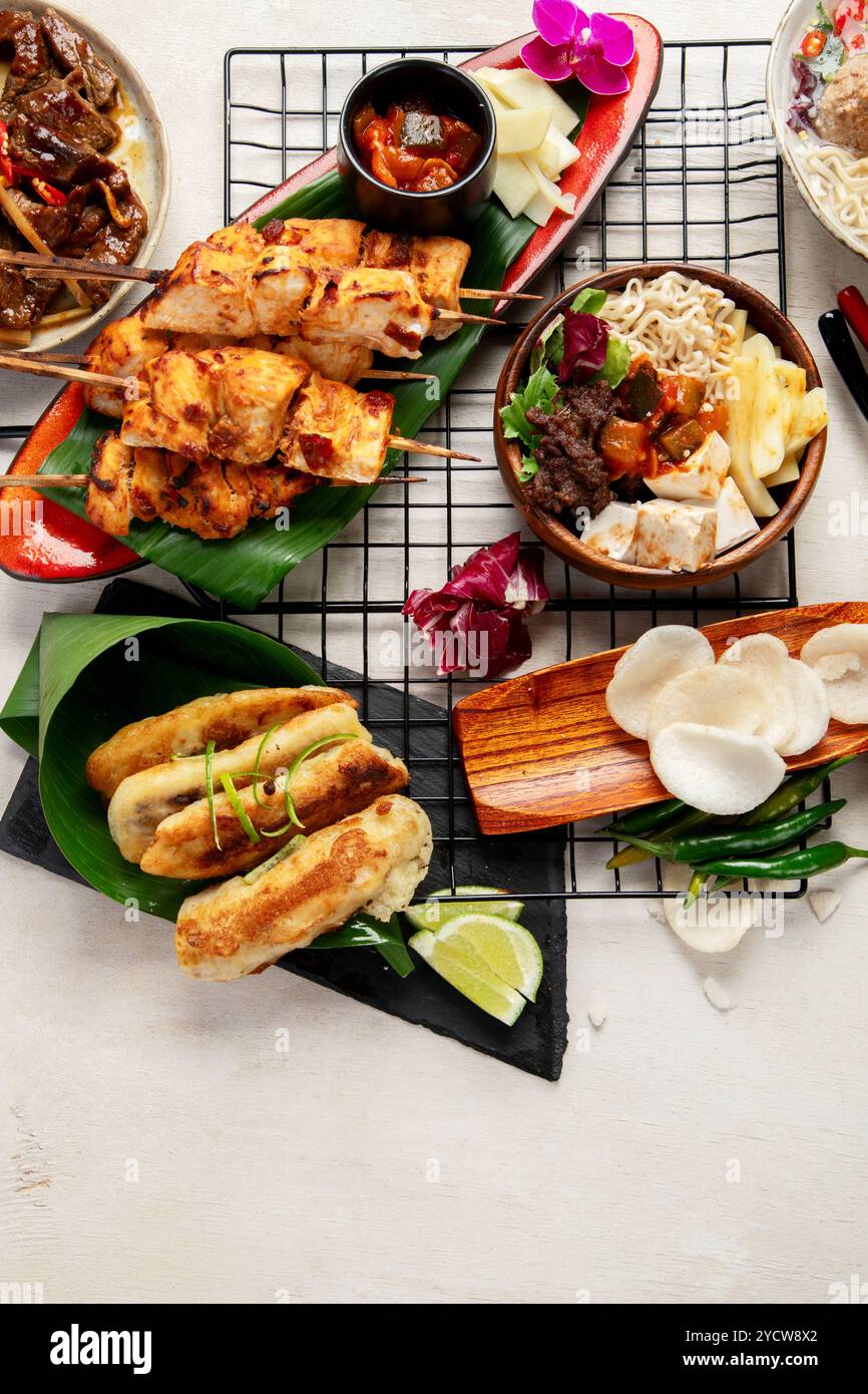 Assorted indonesian food set- nasi goreng, Rendang Pork, satay, bakso ...