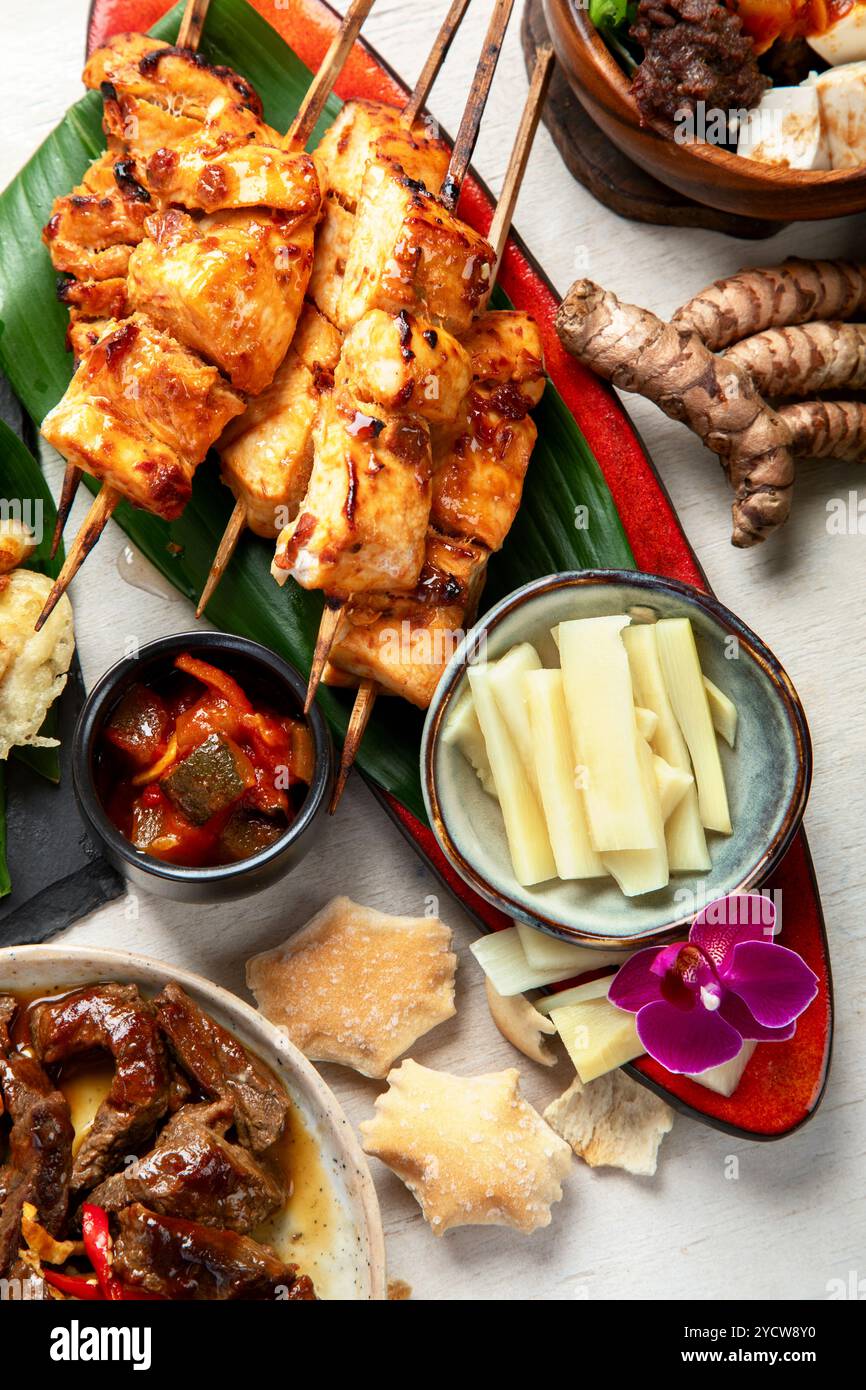 Assorted indonesian food set- nasi goreng, Rendang Pork, satay, bakso ...