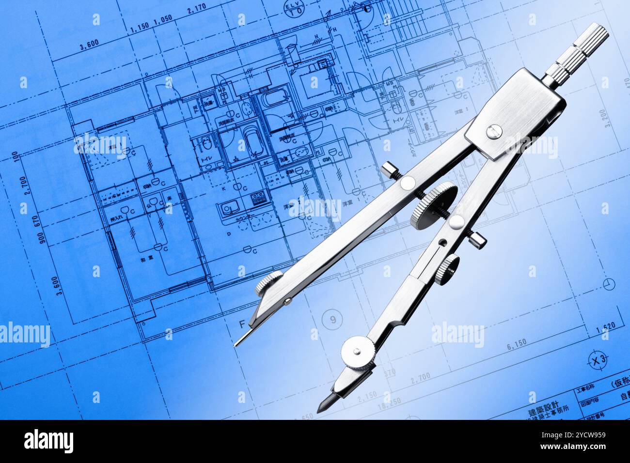 Compasses and drawings Stock Photo - Alamy