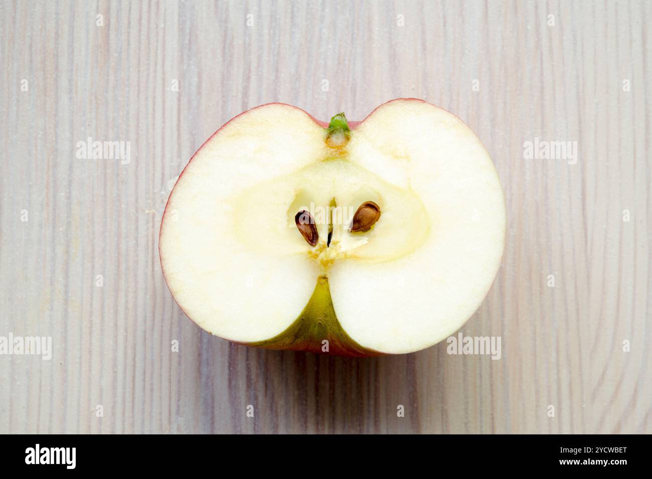 Apple half red hi-res stock photography and images - Alamy