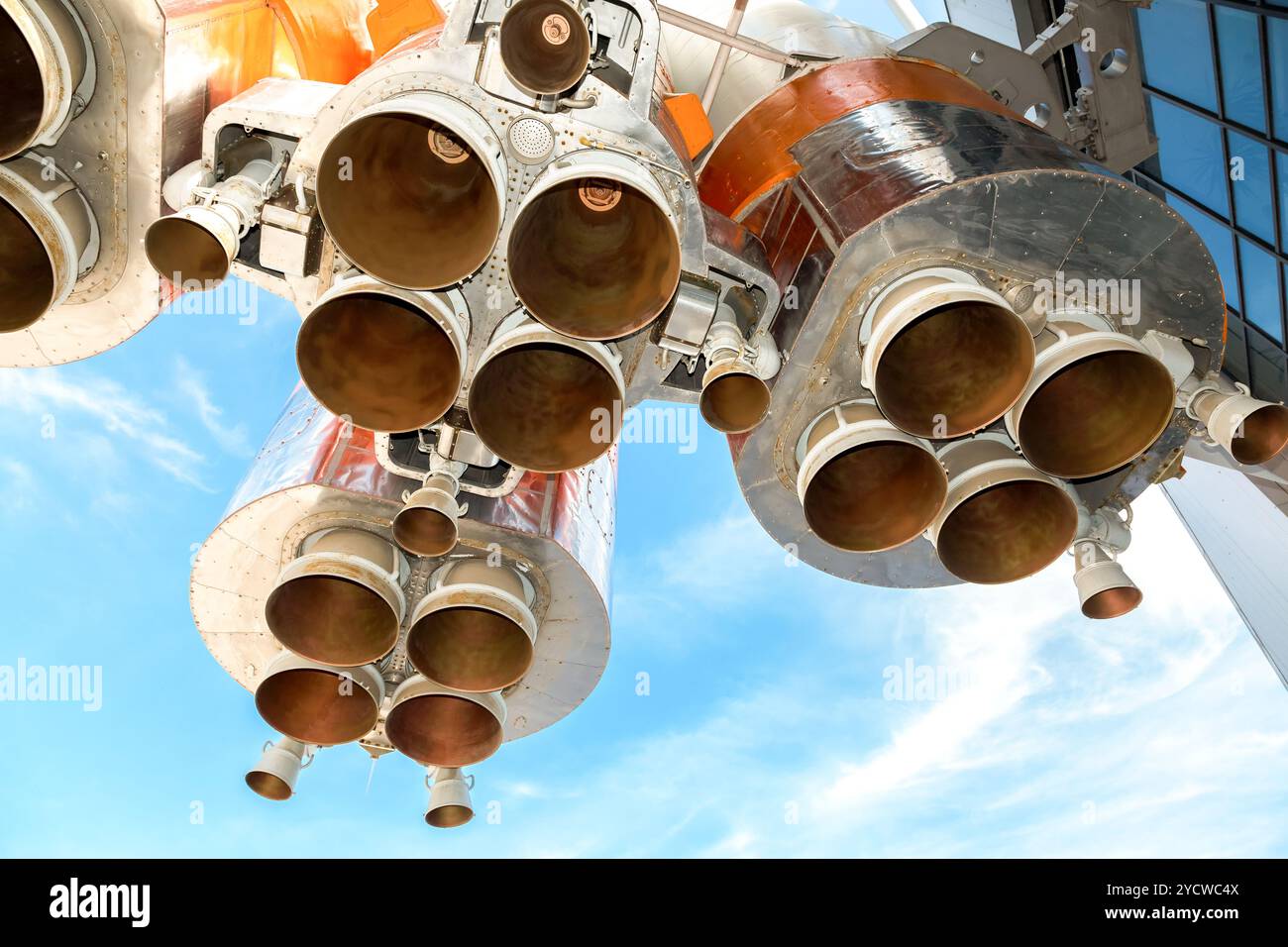 Space rocket engines of the russian spacecraft over blue sky background ...