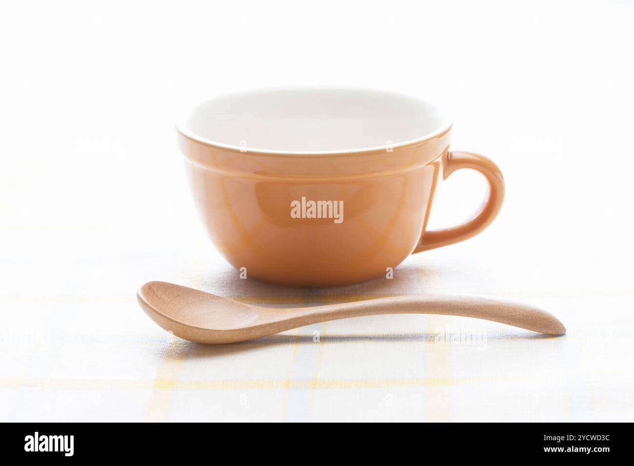 Cup and spoon Stock Photo - Alamy