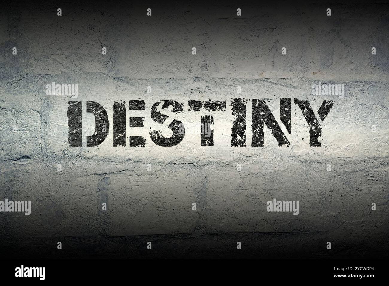 destiny stencil print on the grunge white brick wall Stock Photo - Alamy