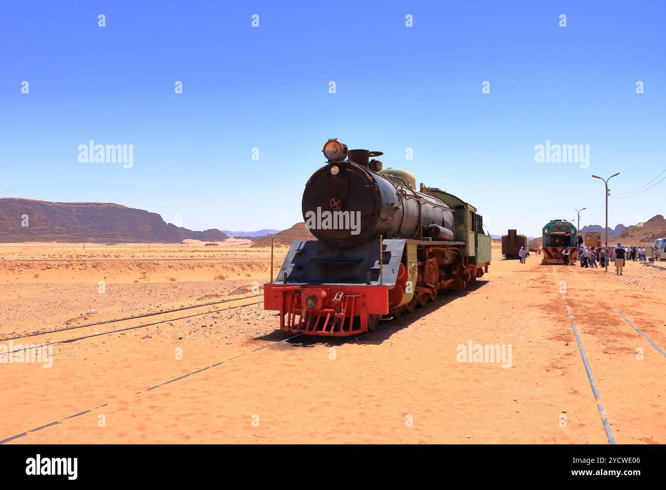 Wadi Rum in Jordan - May 15 2024: people visit the old Locomotive train ...