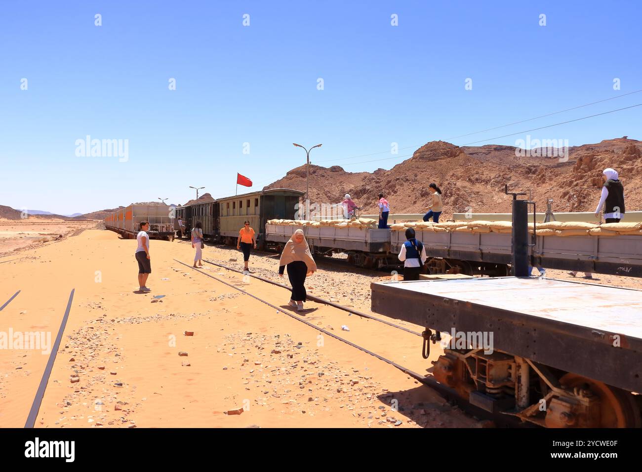 Wadi Rum in Jordan - May 15 2024: people visit the old Locomotive train ...