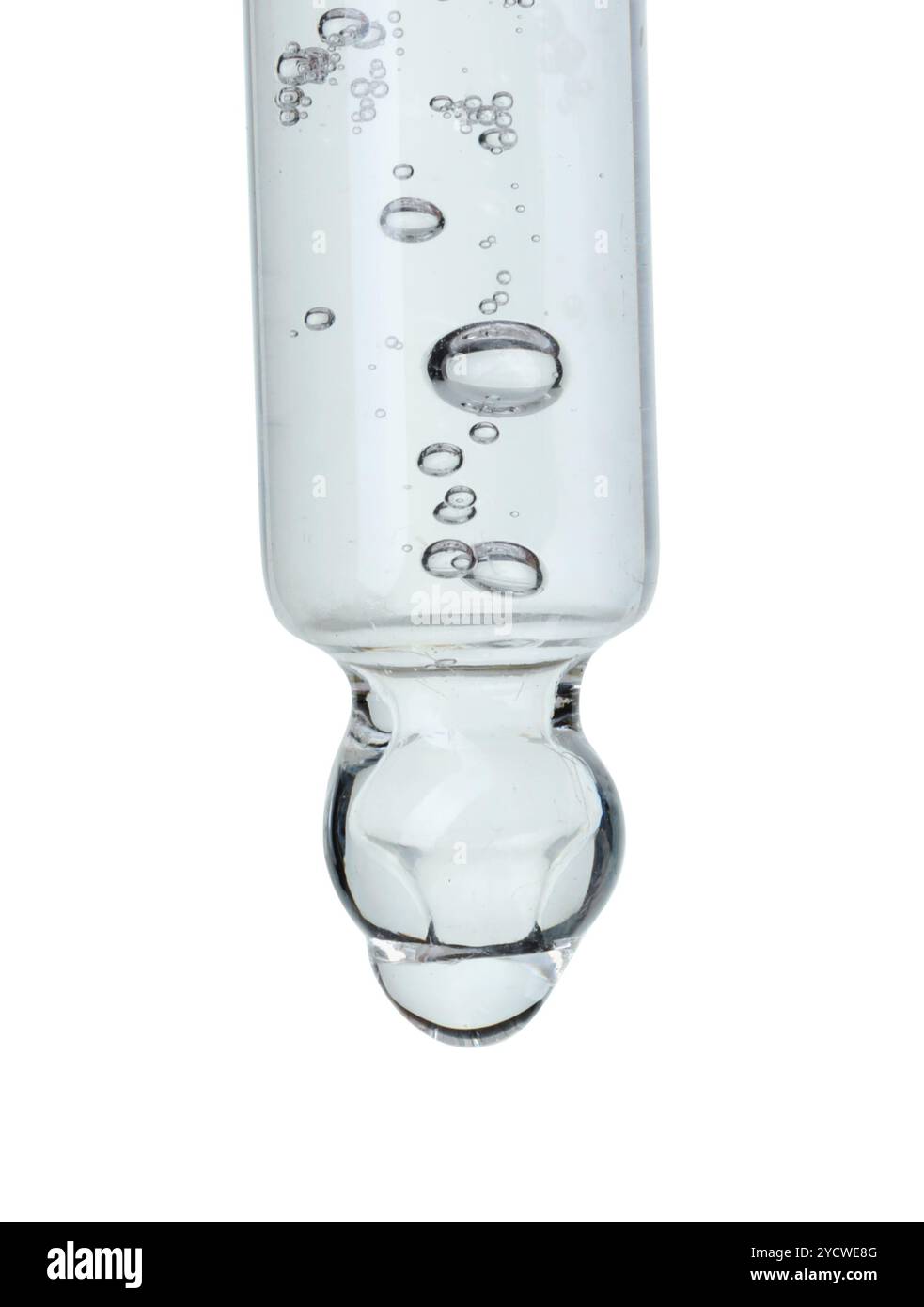 Dripping cosmetic serum from pipette on white background Stock Photo ...