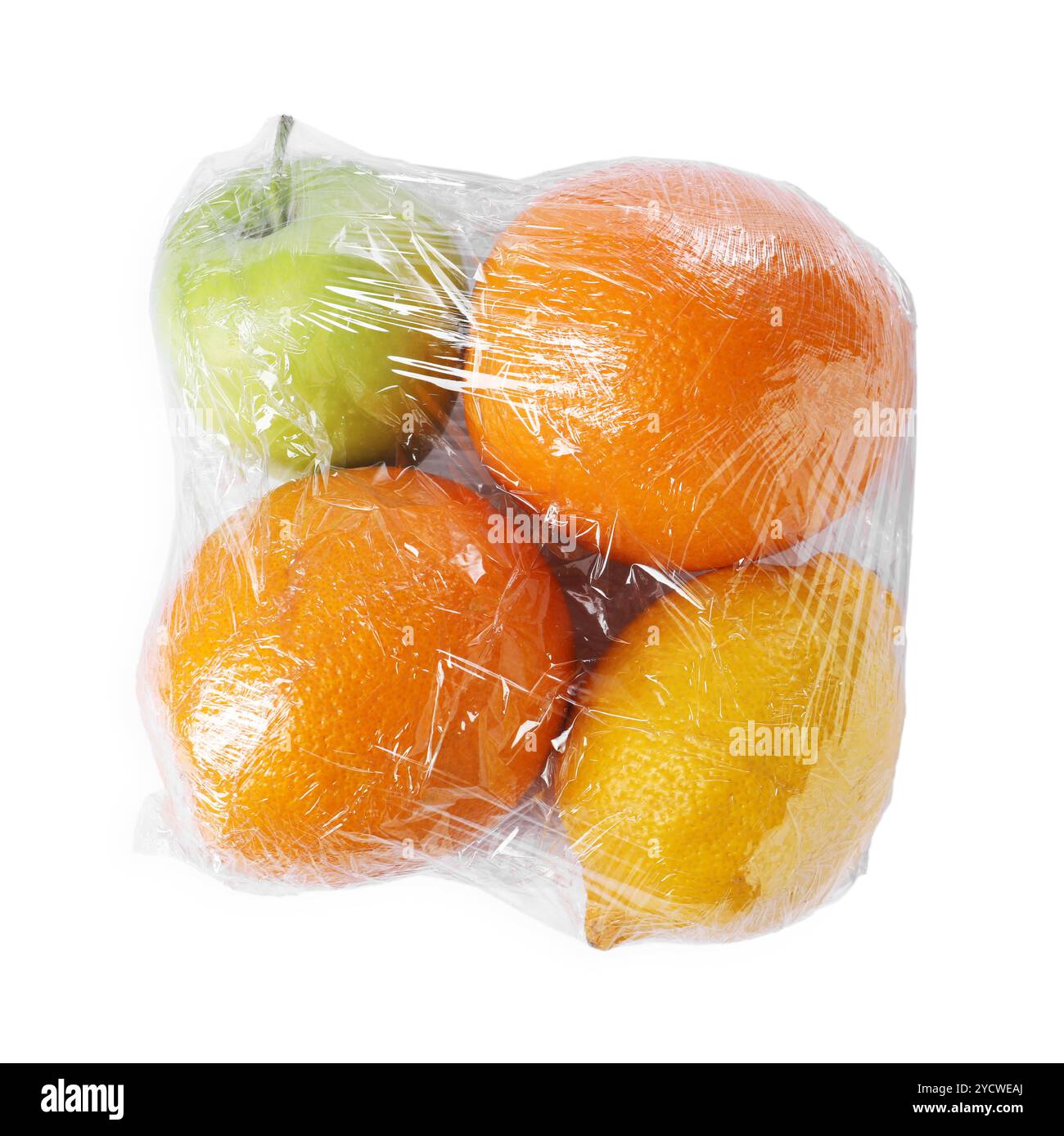 Fresh fruits with plastic food wrap isolated on white, top view Stock ...