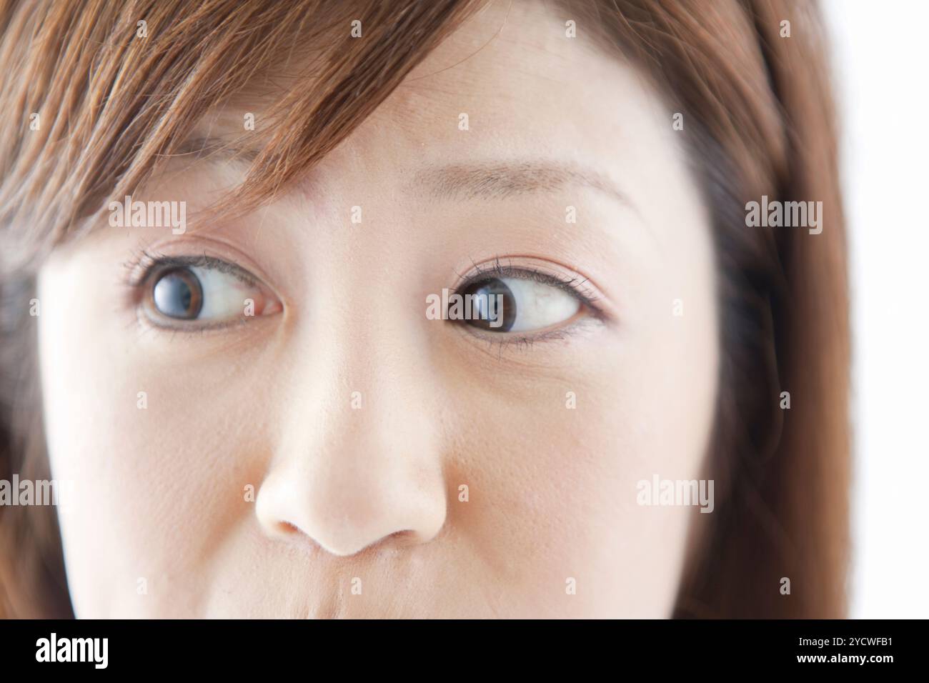 Woman with troubled expression Stock Photo - Alamy