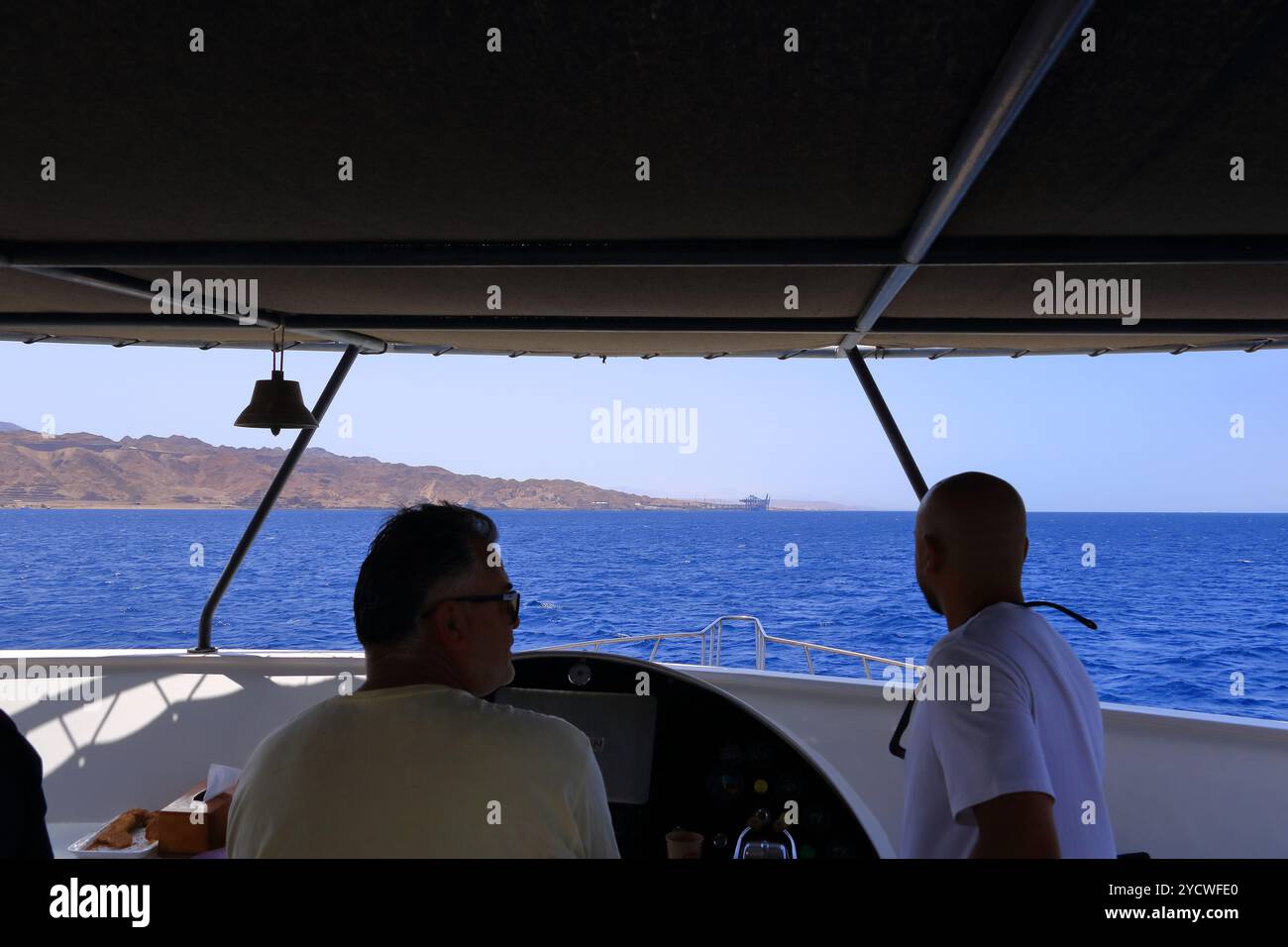 Aqaba in Jordan - May 17 2024: people enjoy a boat trip at the Gulf of ...