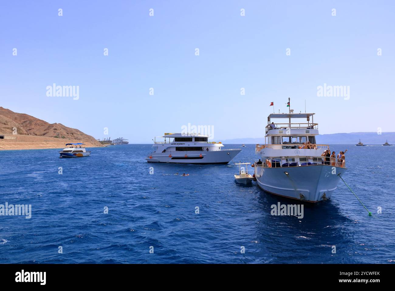 Aqaba in Jordan - May 17 2024: boats for snorkeling and diving in the ...
