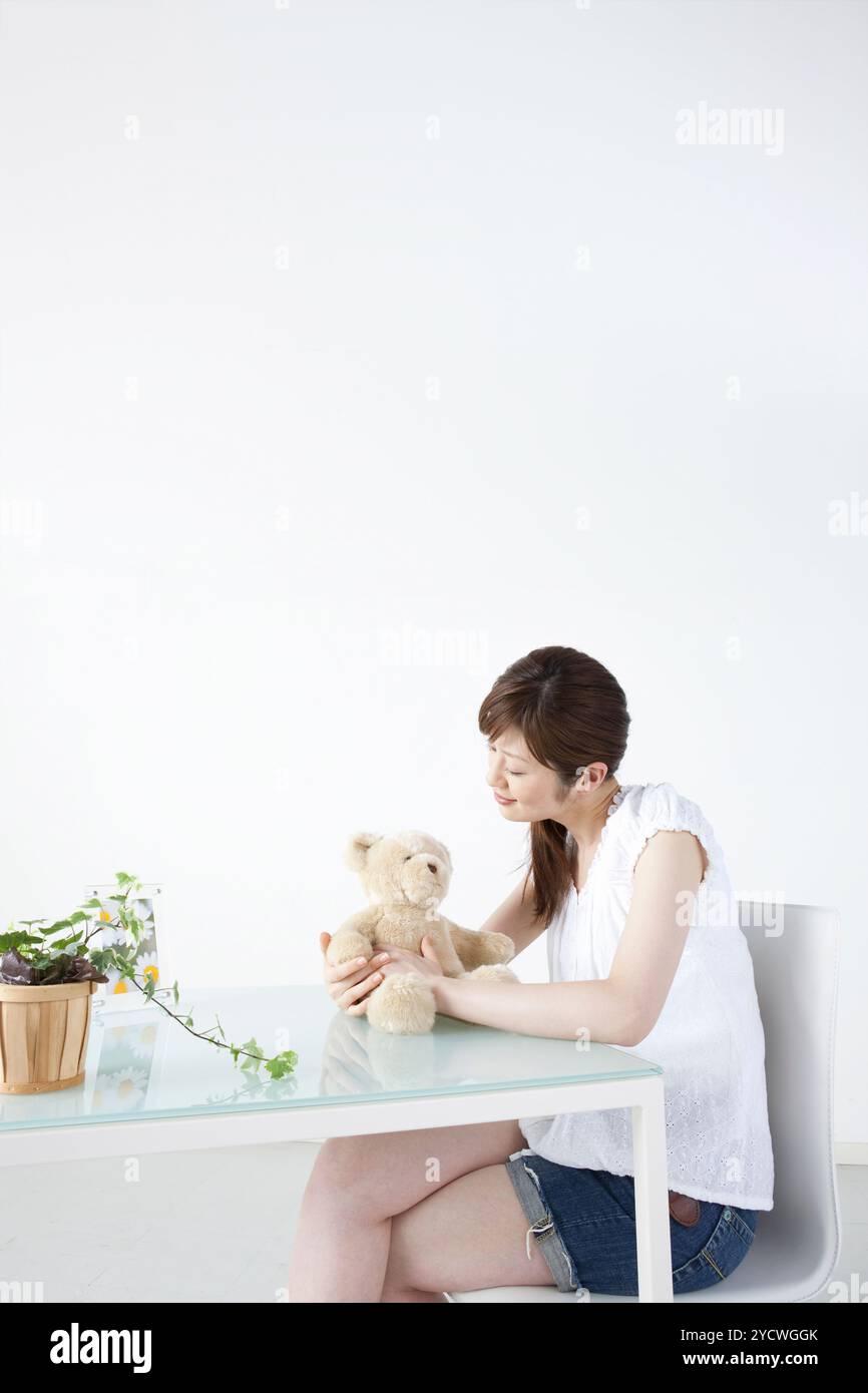 Holding stuffed animal hi-res stock photography and images - Alamy