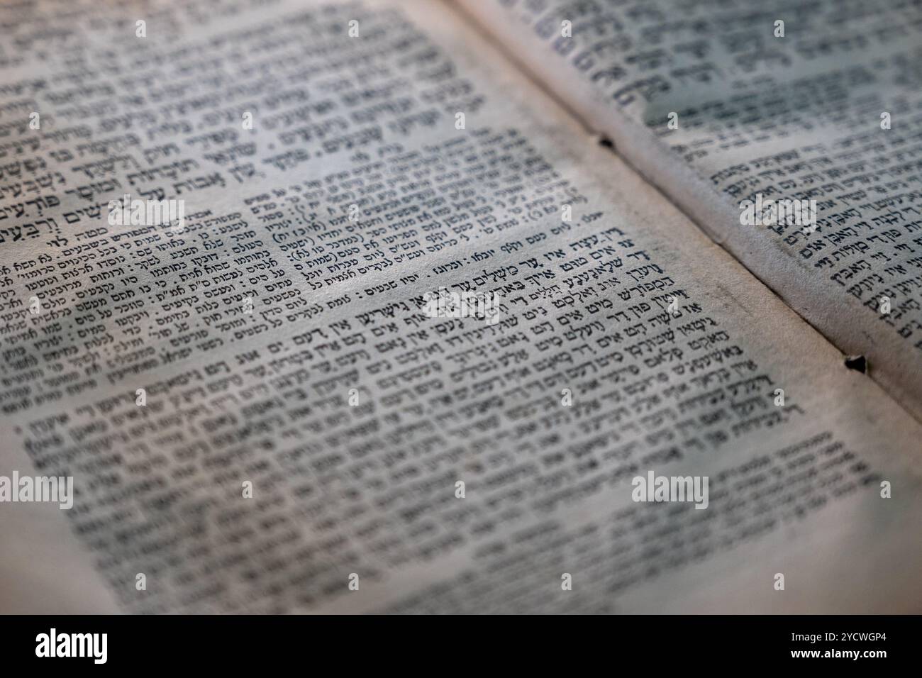 closeup of the texture of an old book written in hebrew - jewish ...