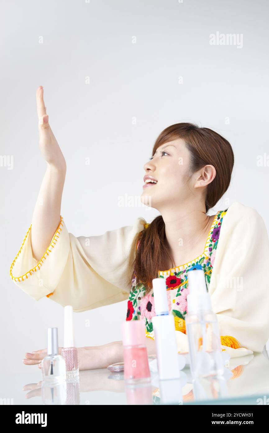 Doing manicure hand young woman hi-res stock photography and images - Alamy