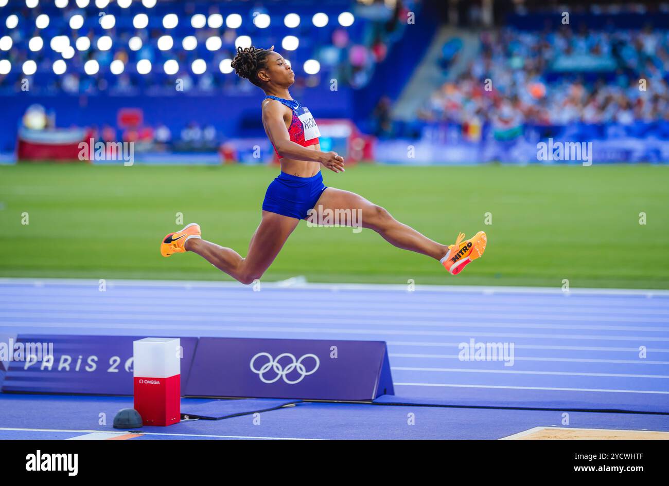 Monae' Nichols participating in the long jump at the Paris 2024 Olympic ...
