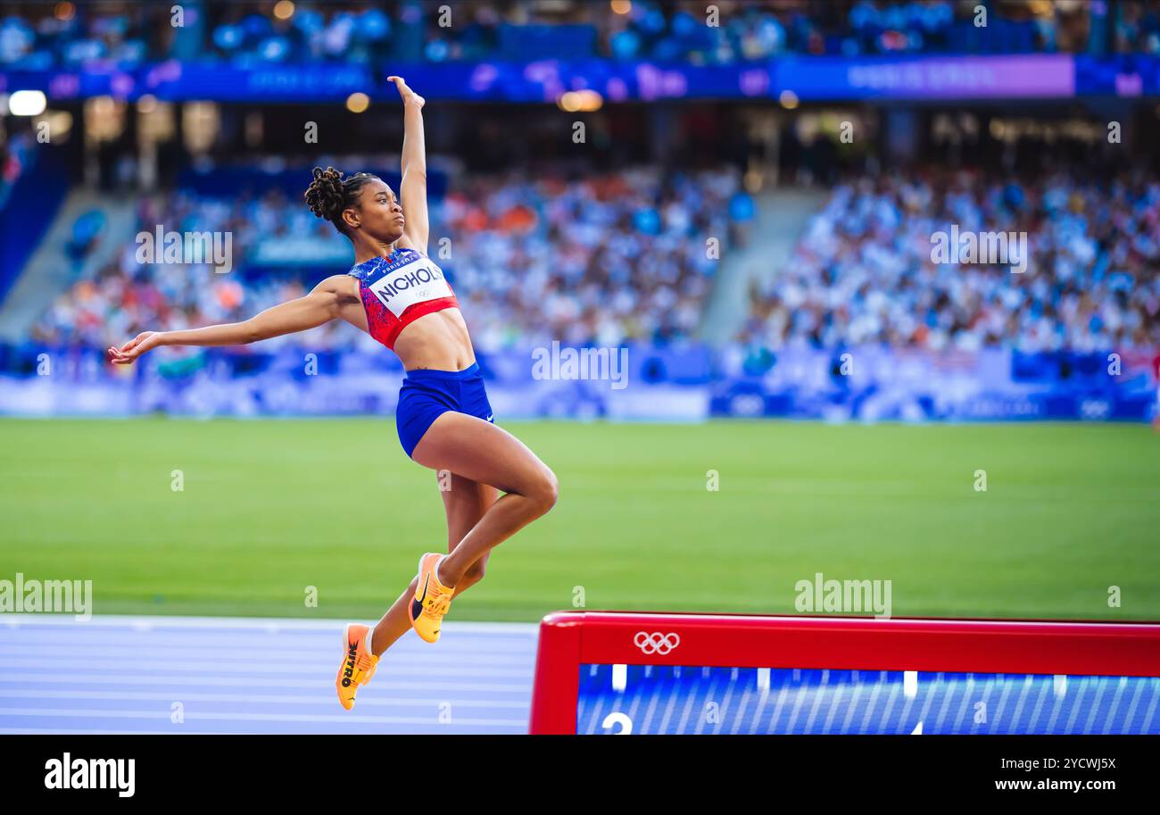 Monae' Nichols participating in the long jump at the Paris 2024 Olympic ...