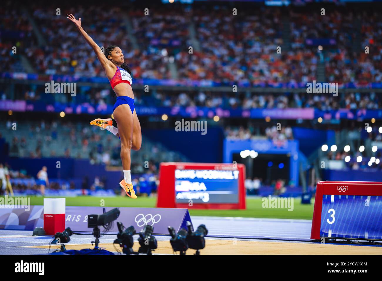 Tara Davis-Woodhall participating in the long jump at the Paris 2024 ...