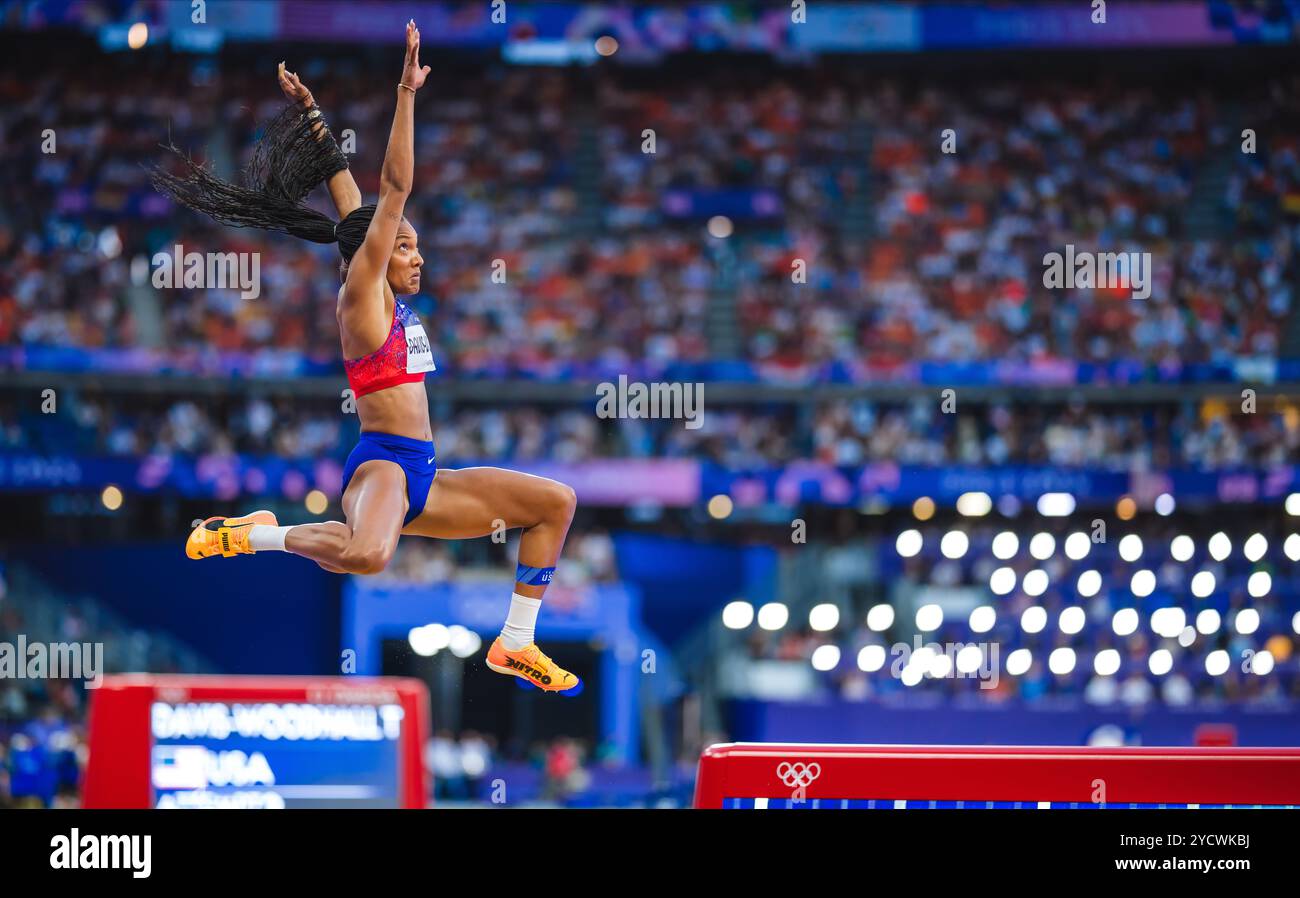 Tara Davis-Woodhall participating in the long jump at the Paris 2024 ...